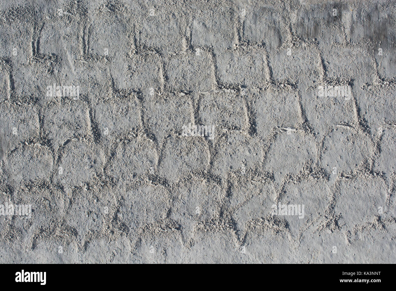 Patterns on a freshly poured concrete surface Stock Photo - Alamy