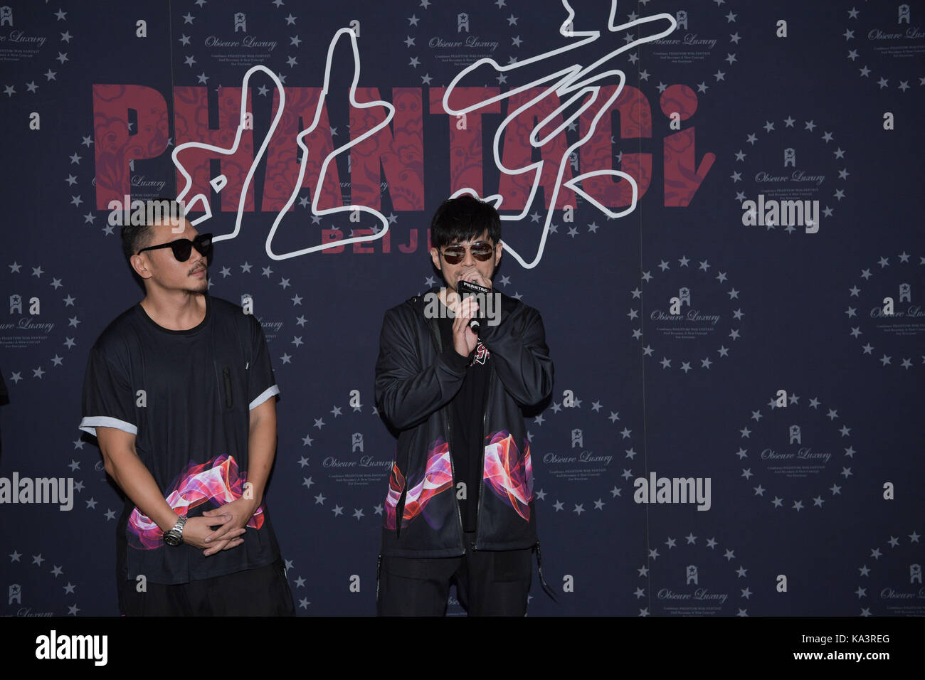 Jay Chou attends the opening ceremony for a new store for his clothing ...