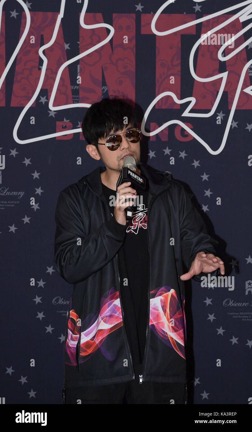 Jay Chou attends the opening ceremony for a new store for his clothing ...