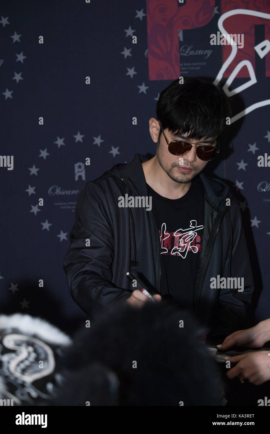 Jay Chou attends the opening ceremony for a new store for his clothing ...