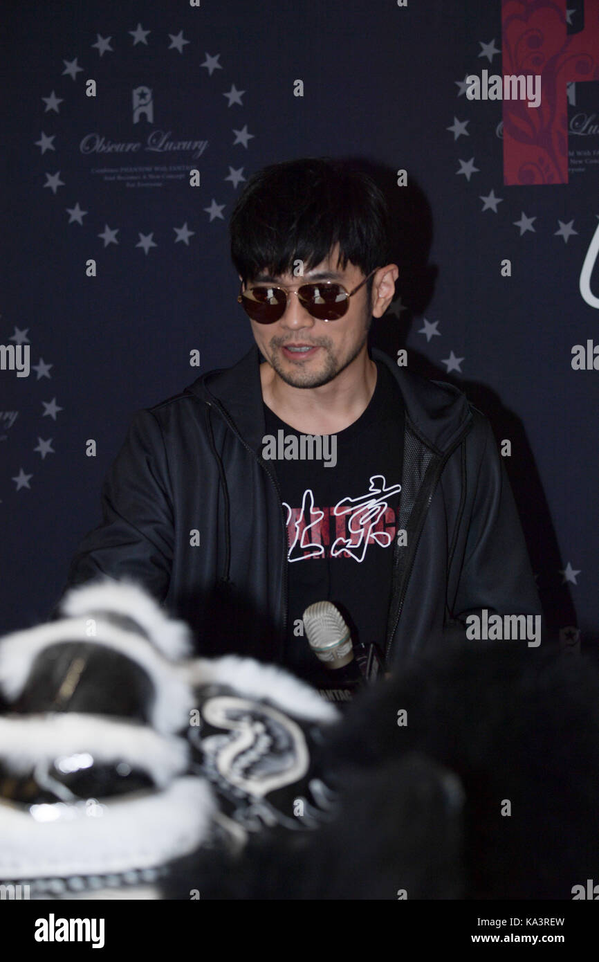 Jay Chou attends the opening ceremony for a new store for his clothing ...