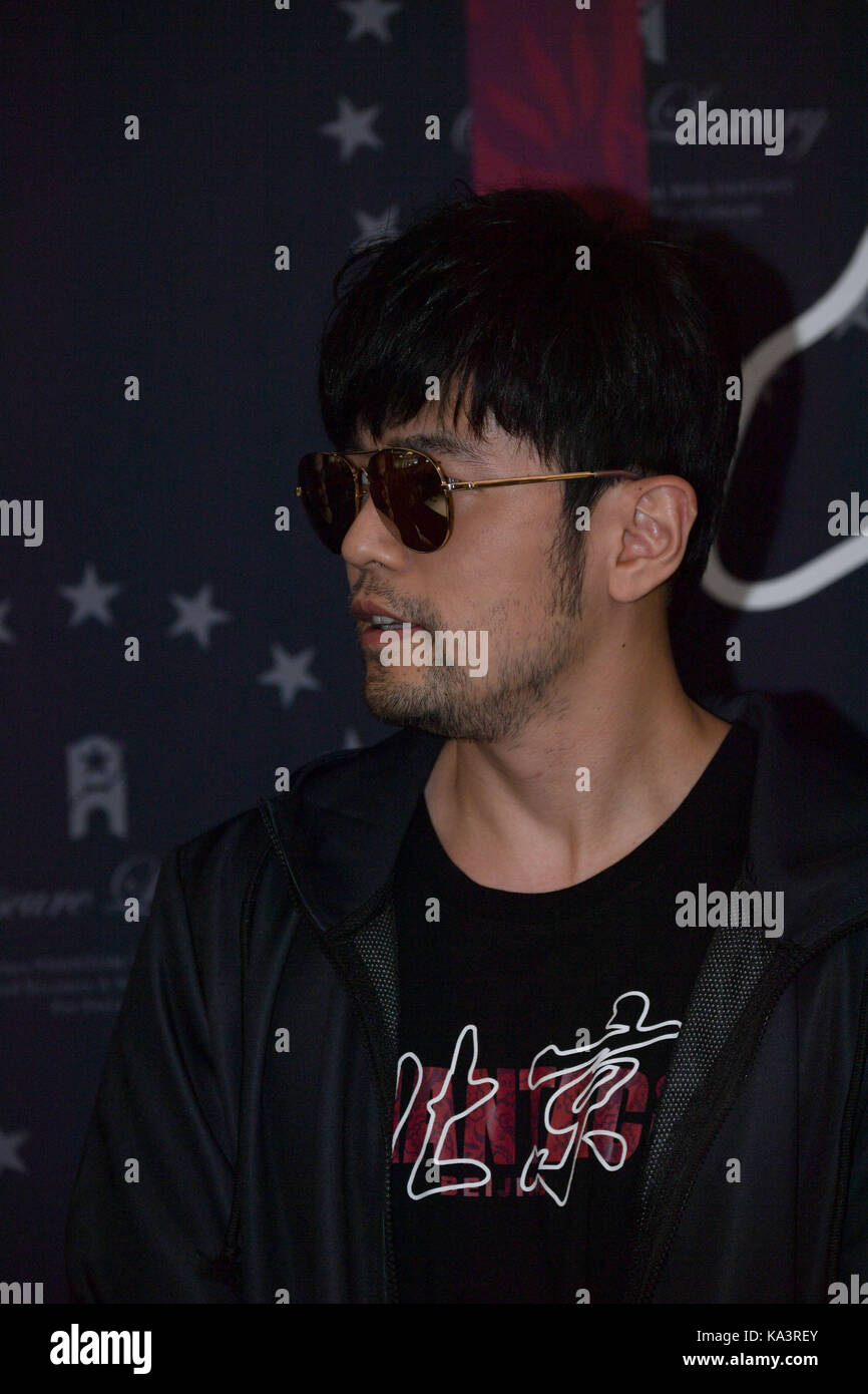 Jay Chou attends the opening ceremony for a new store for his clothing ...