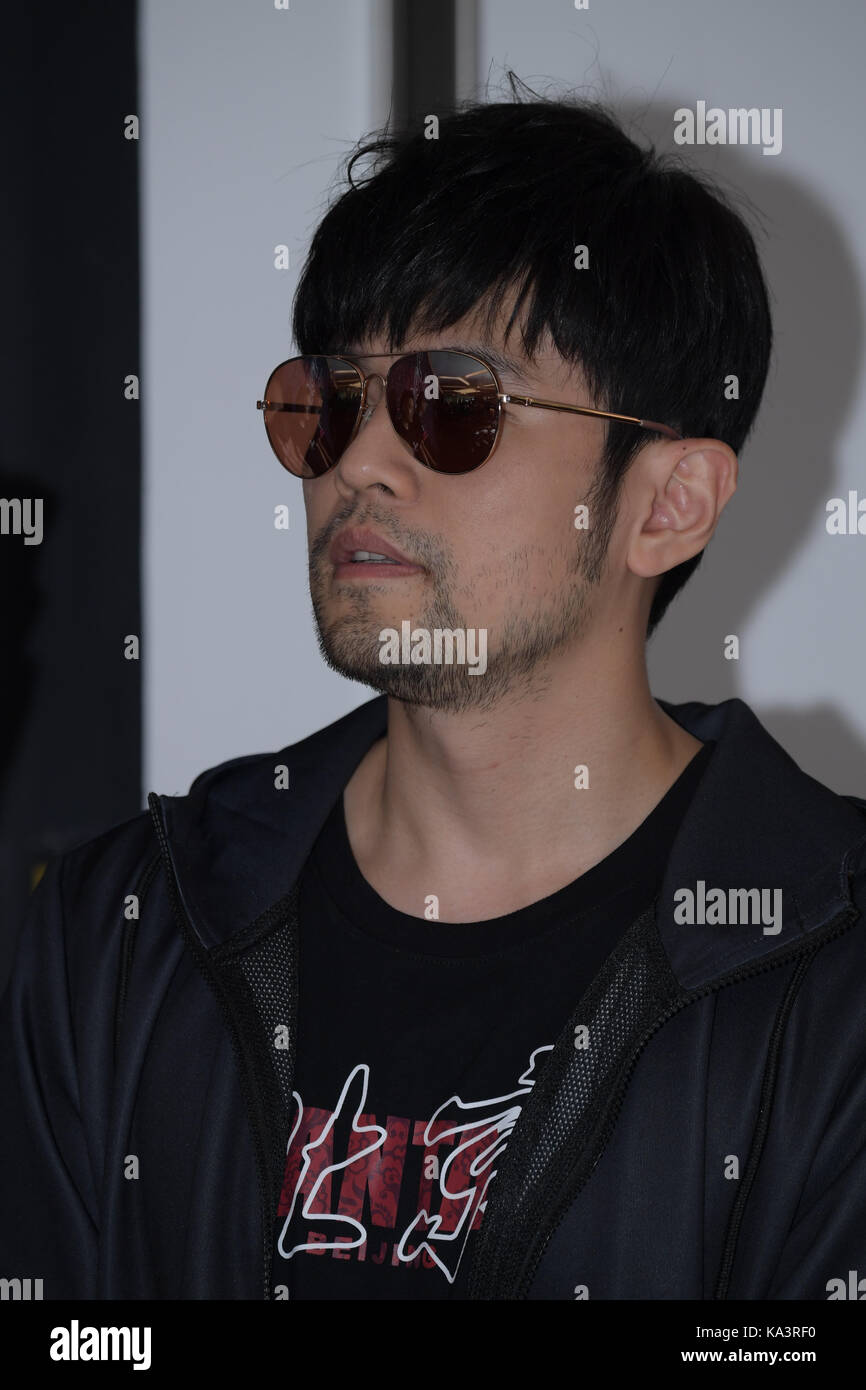 Jay Chou attends the opening ceremony for a new store for his clothing ...