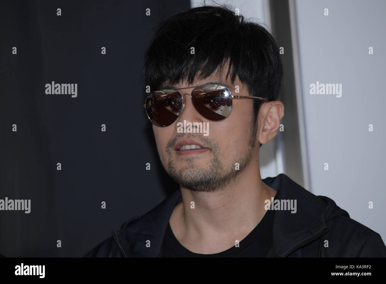 Jay Chou attends the opening ceremony for a new store for his clothing ...