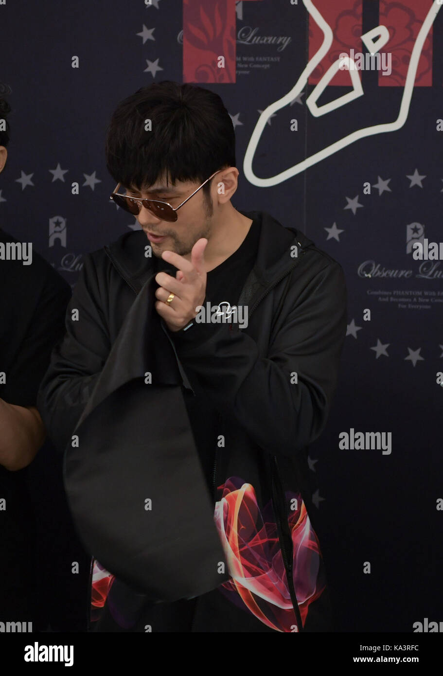 Jay Chou attends the opening ceremony for a new store for his clothing ...