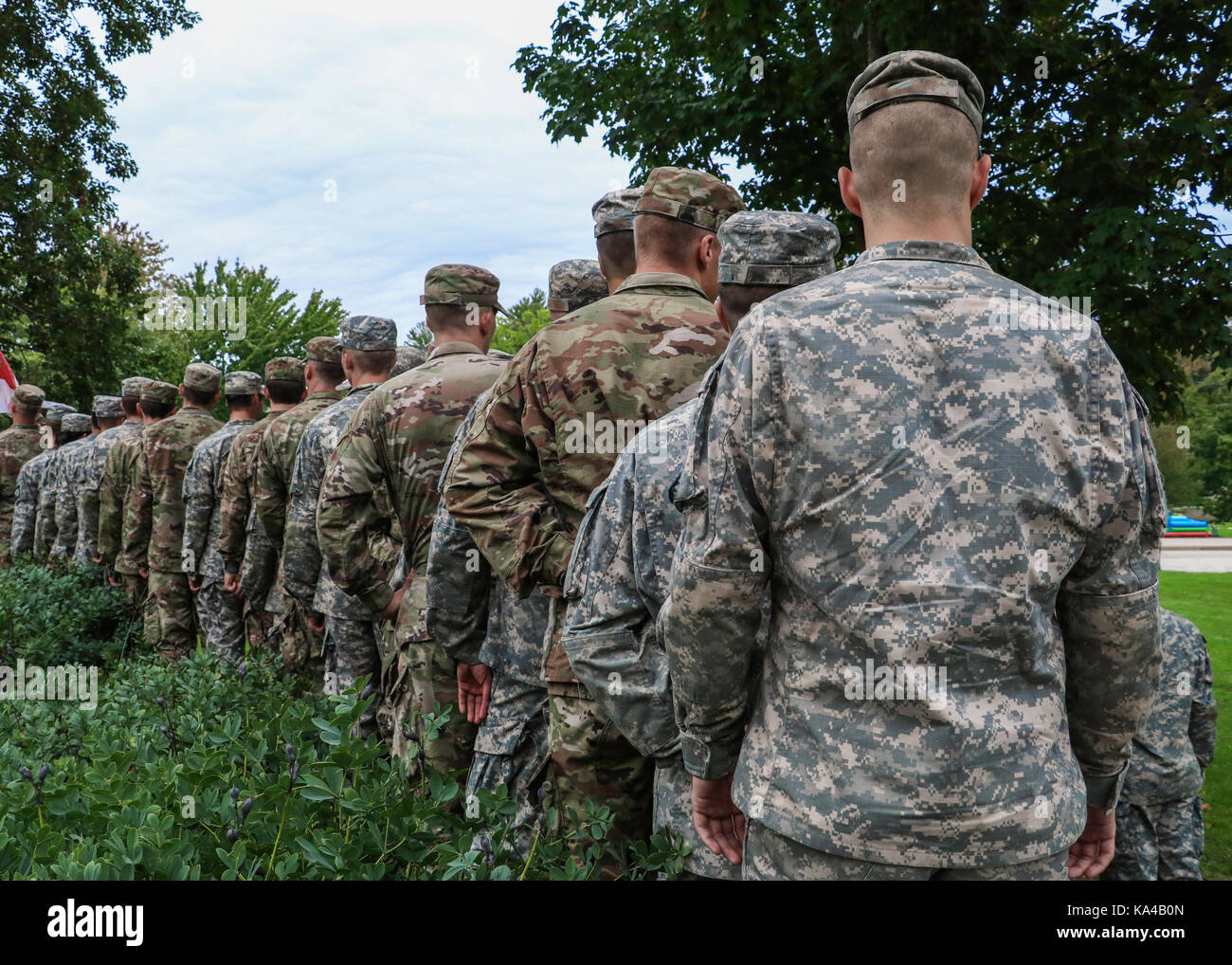 Standing soldiers pictured from back Stock Photo - Alamy