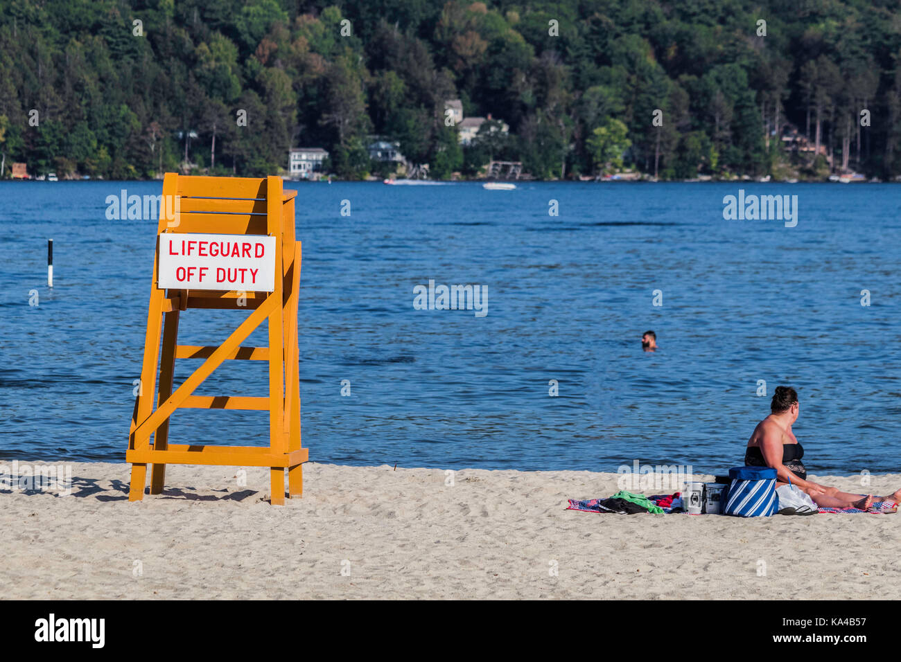 Woman and lifeguard chair hi-res stock photography and images - Alamy