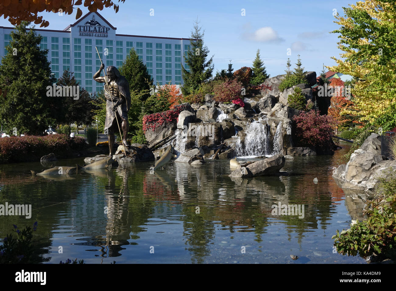 A sculpture of a Tulalip Indian sperarfishing for salmon Stock Photo ...