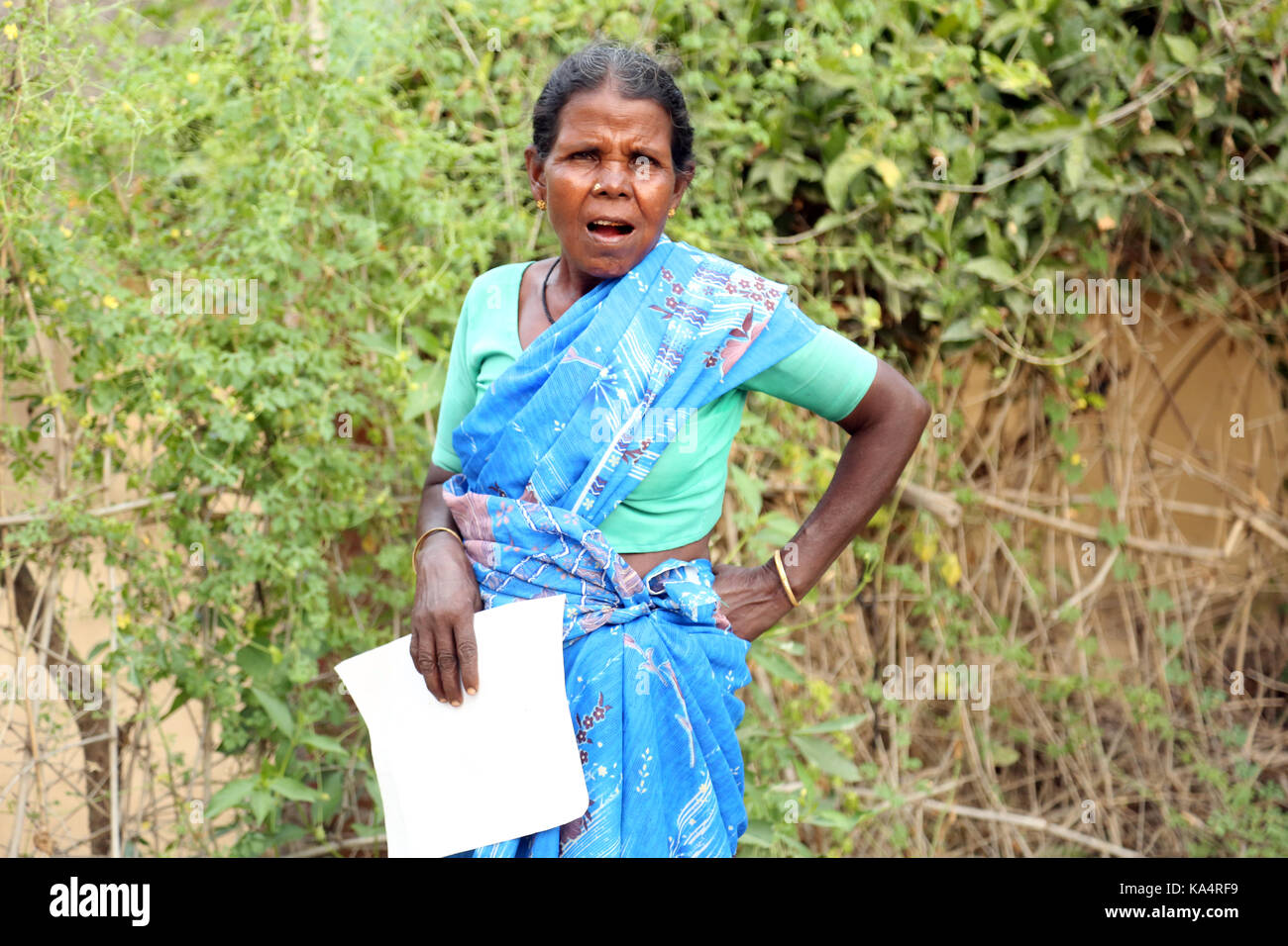 Portrait old woman looking at camera Stock Photo - Alamy