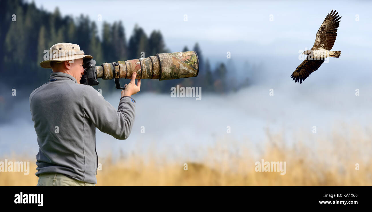 Professional wildlife photographer outdoor Stock Photo - Alamy