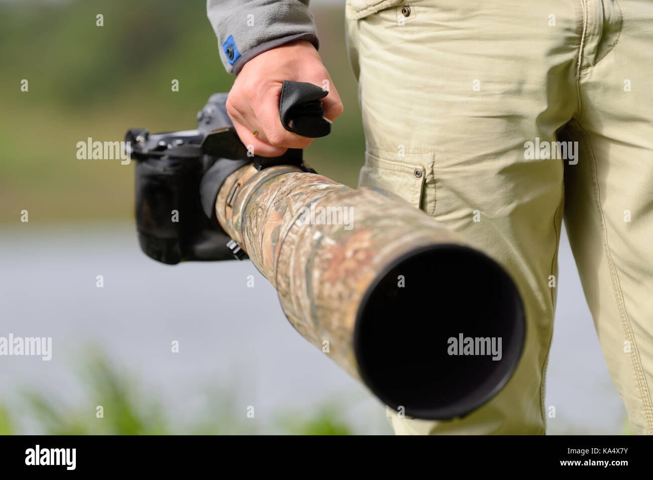 Professional wildlife photographer outdoor Stock Photo - Alamy