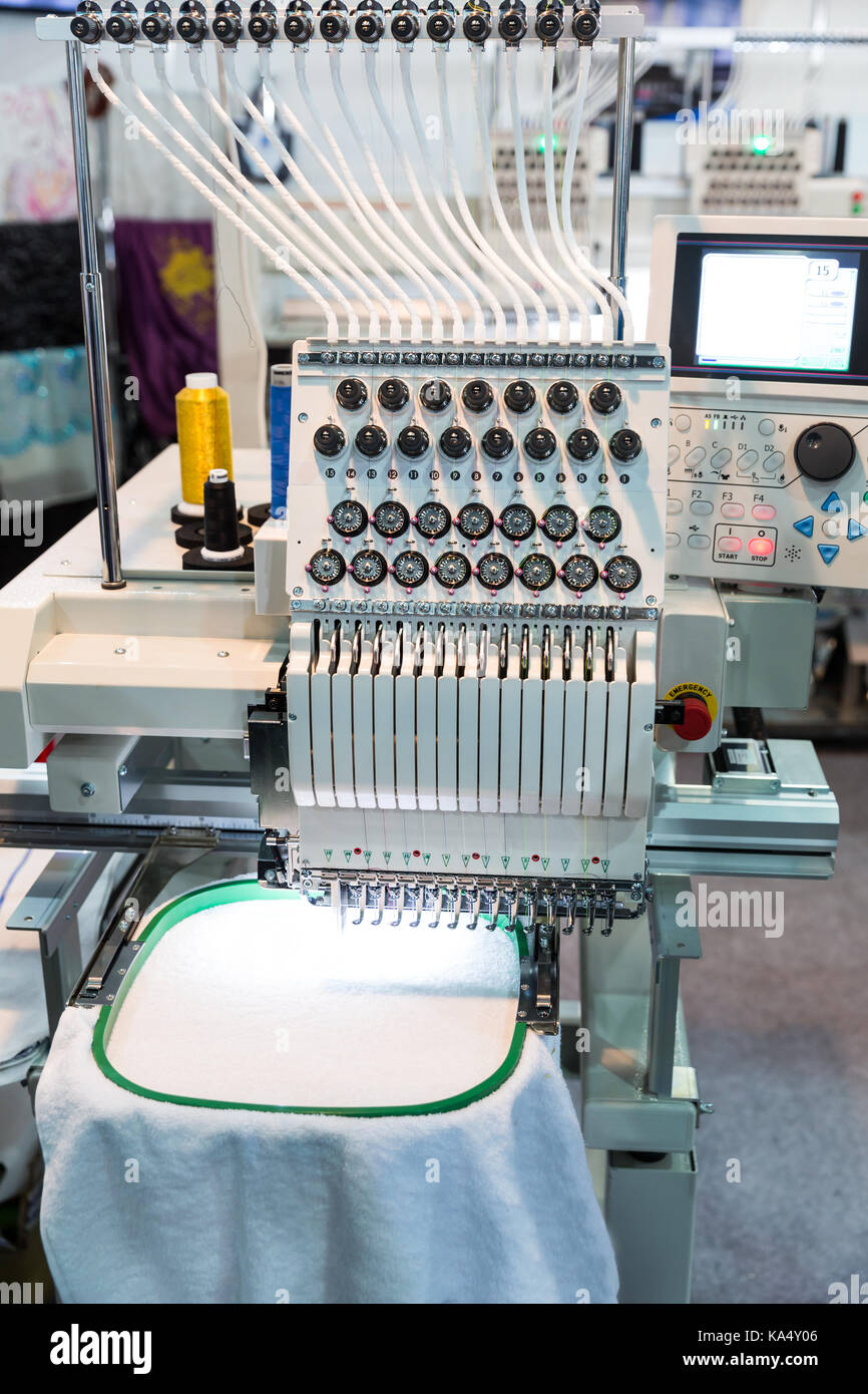 Professional sewing machine embroidery color pattern on textile fabric ...