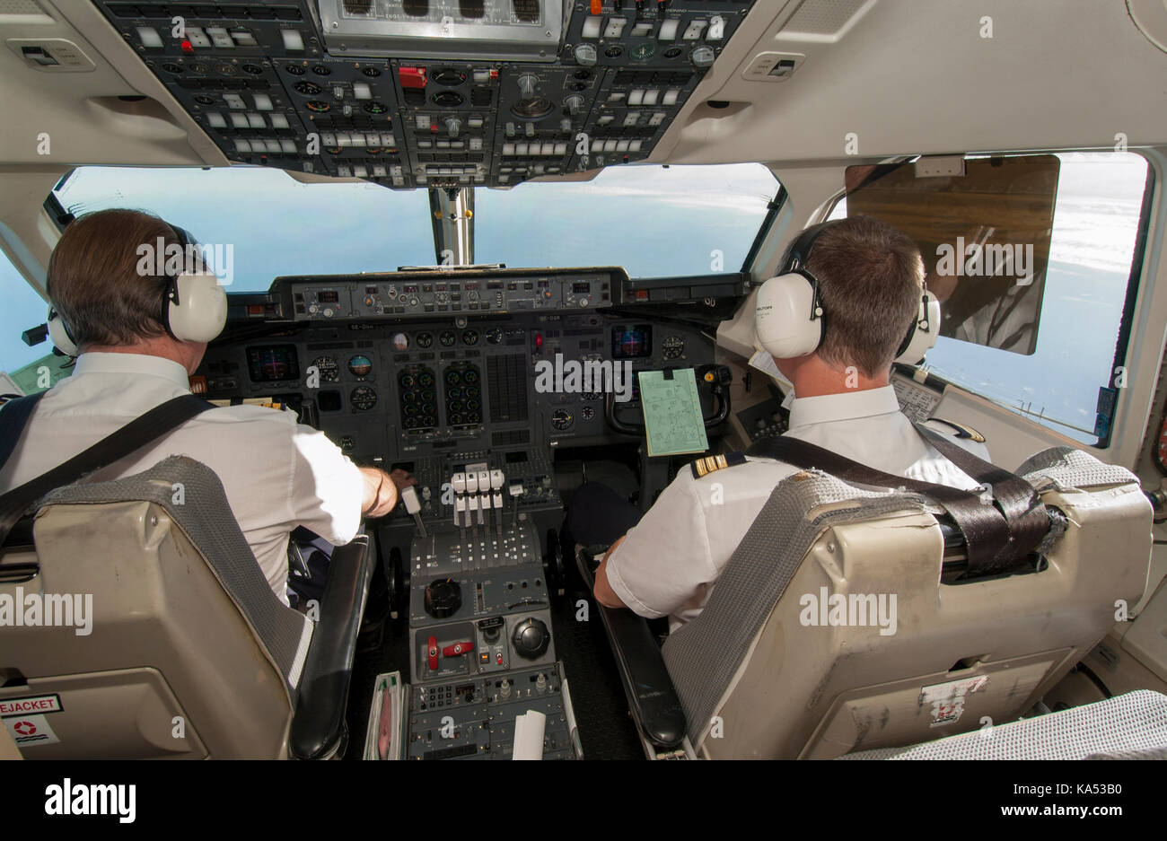 On board a cockpit on an airplane Stock Photo - Alamy
