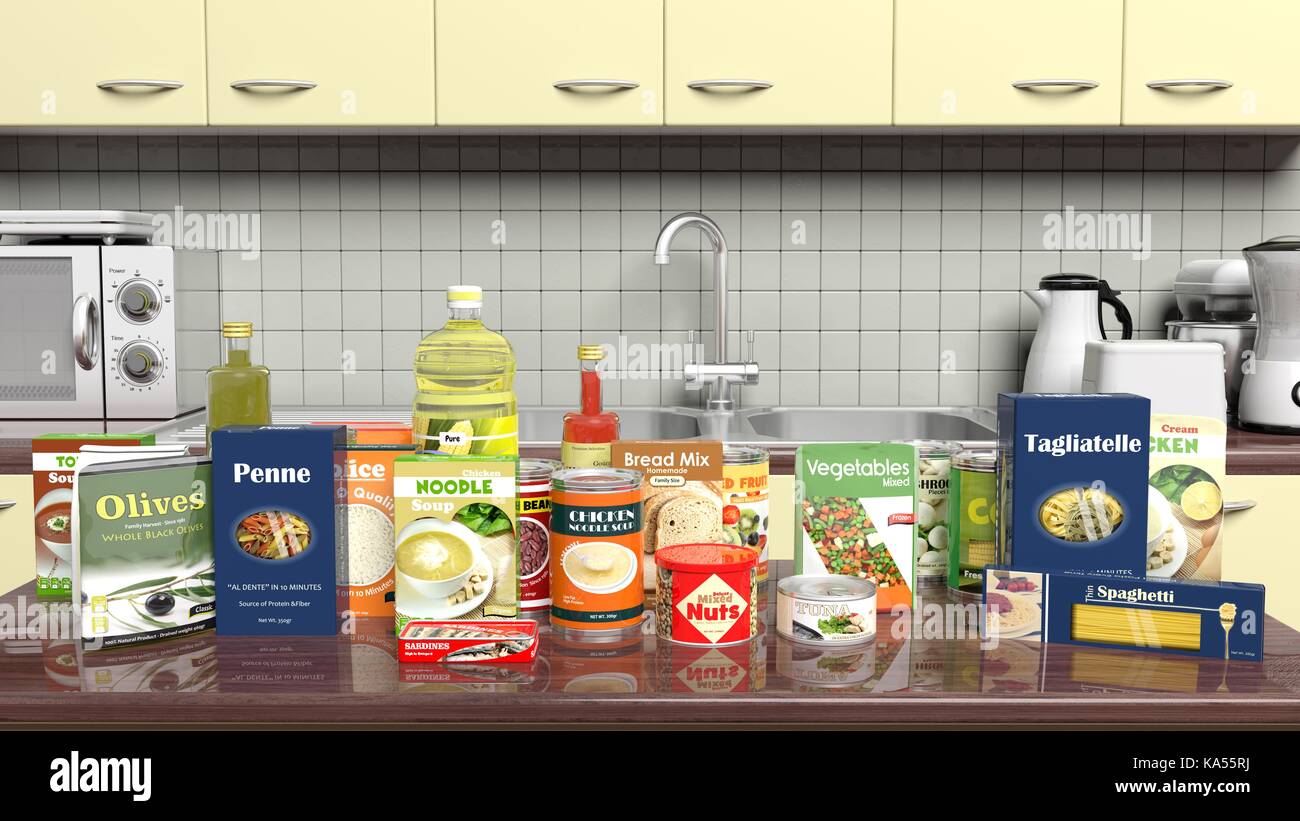Kitchen cabinet closeup with grocery products on worktop Stock Photo ...