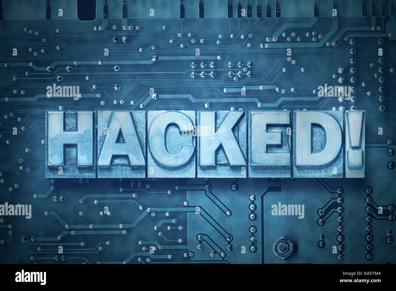 hacked exclamation made from metallic letterpress blocks on the pc ...