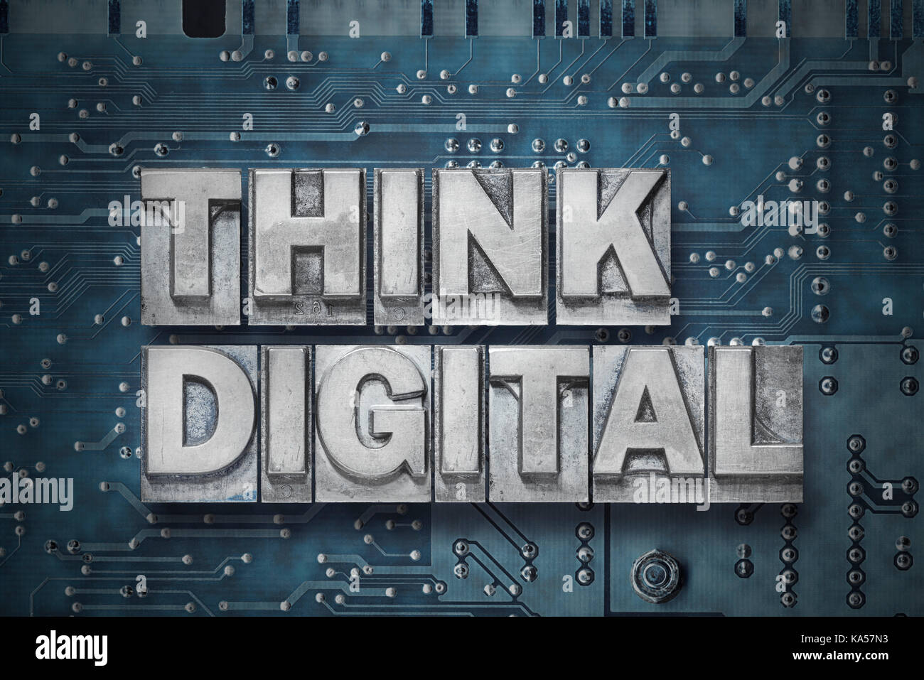 think digital phrase made from metallic letterpress blocks on the pc ...
