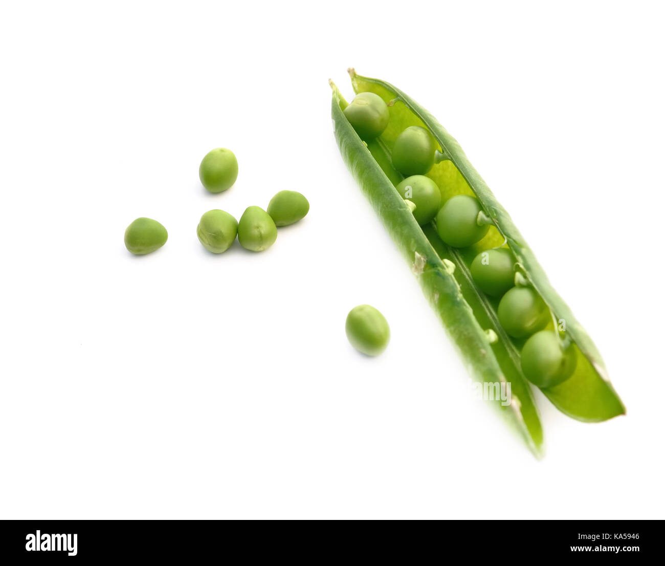 peas on open pod isolated on white background Stock Photo - Alamy