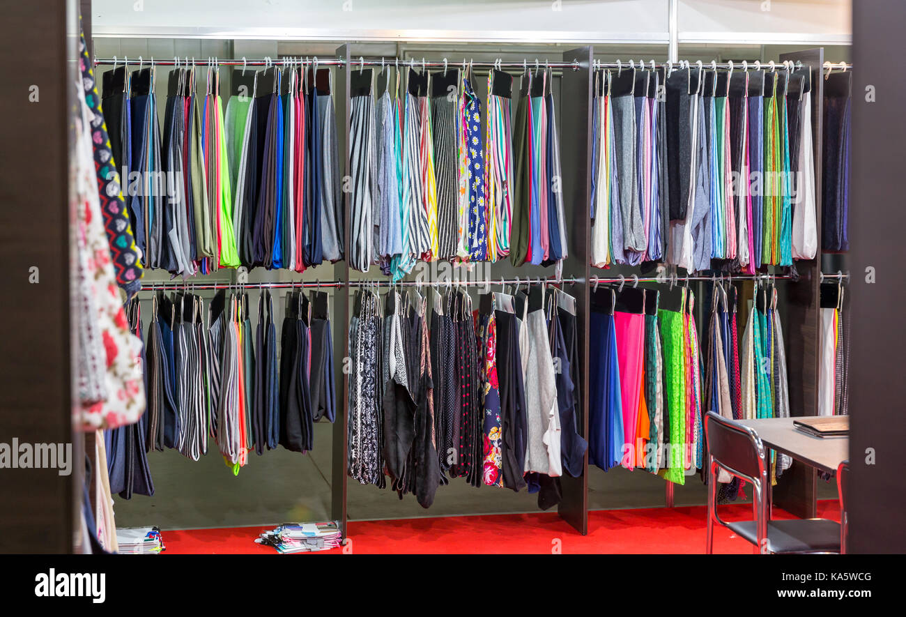 Dresses and cloth, clothing shop, boutique, fashion store. Colorful ...