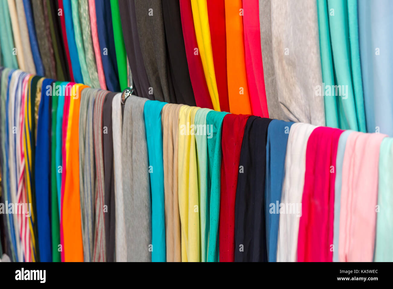 Fabric textile showcase, colorful materials closeup. Clothing factory ...