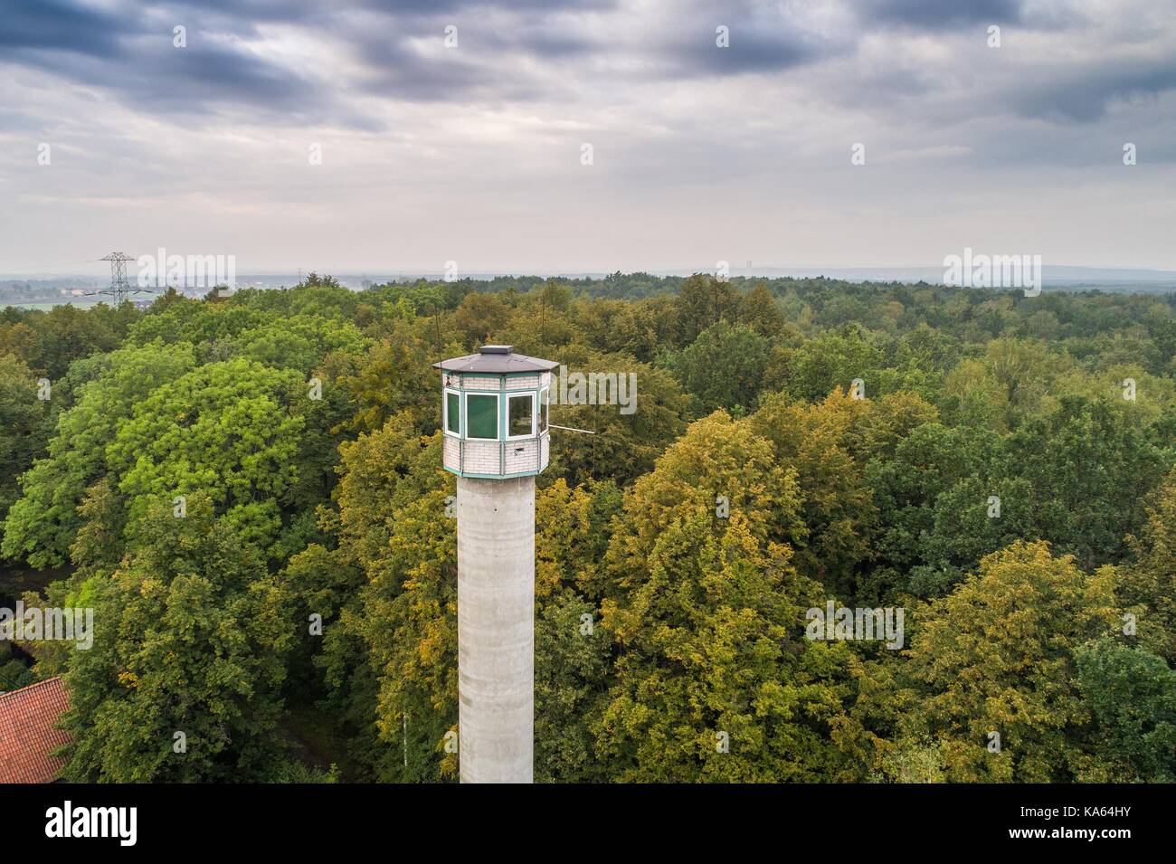 Tall watch tower in the forest. Fire prevention Stock Photo - Alamy