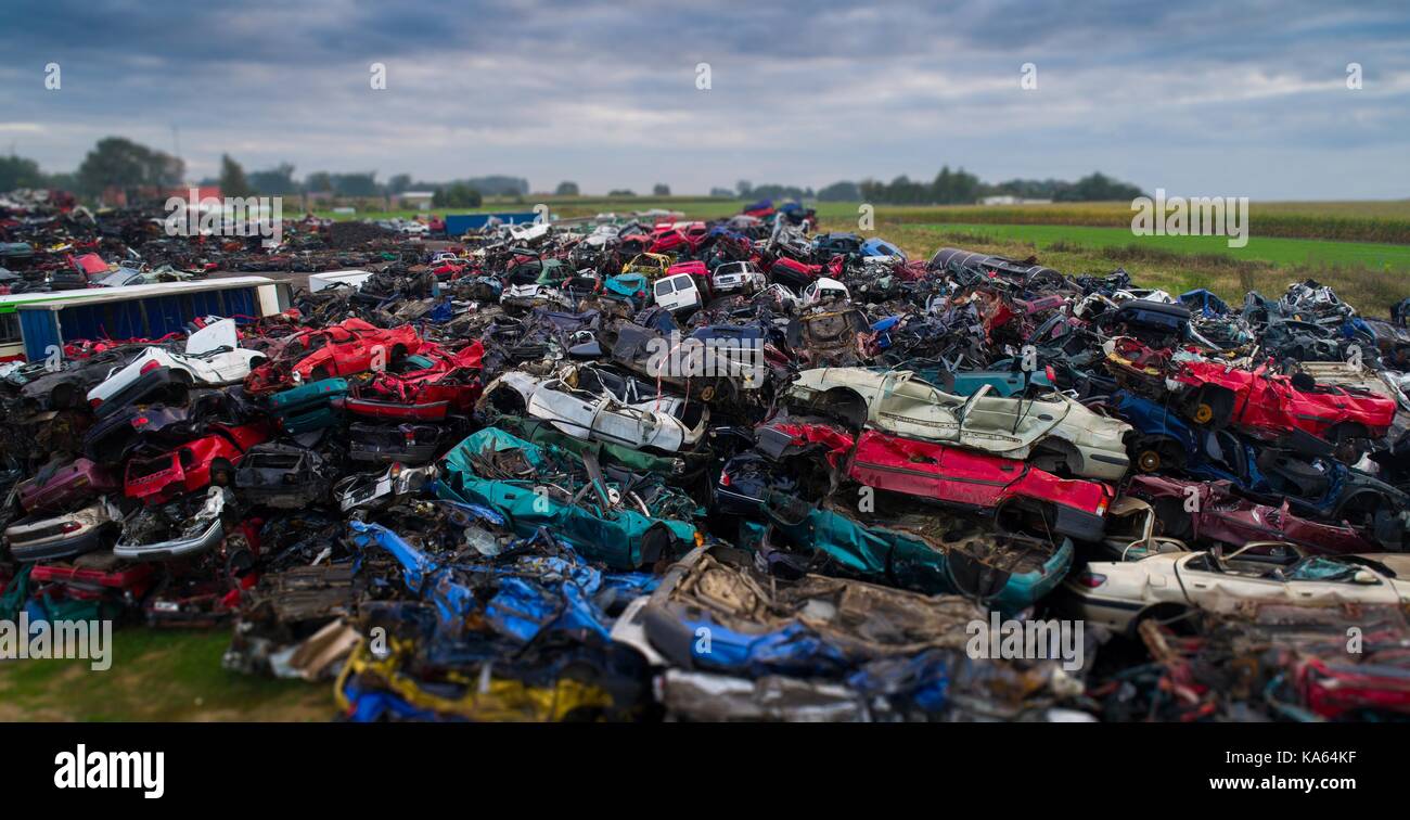 Scrapped cars stacked on a scrap yard. Car recycling Stock Photo - Alamy