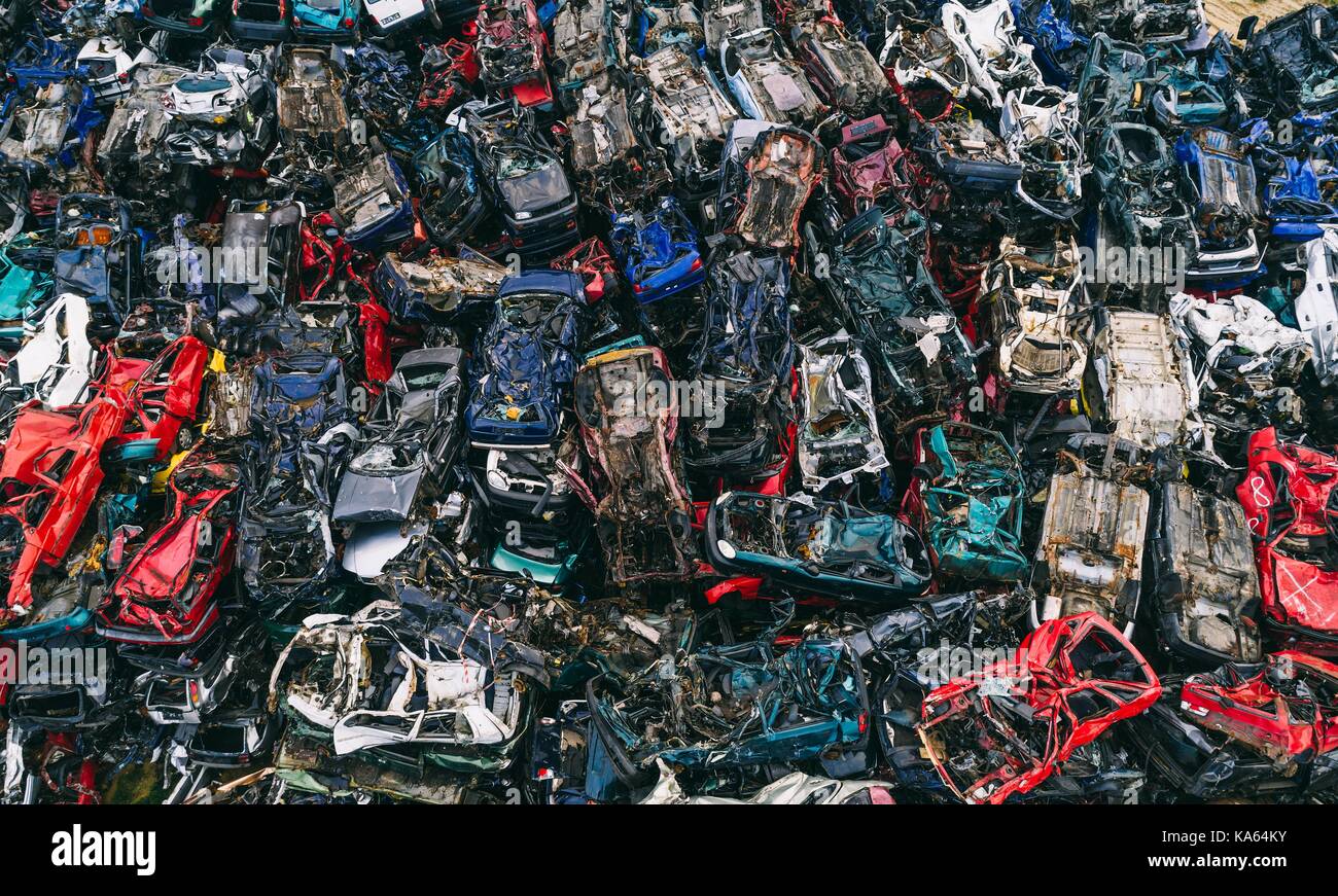 Scrapped cars stacked on a scrap yard. Car recycling Stock Photo - Alamy