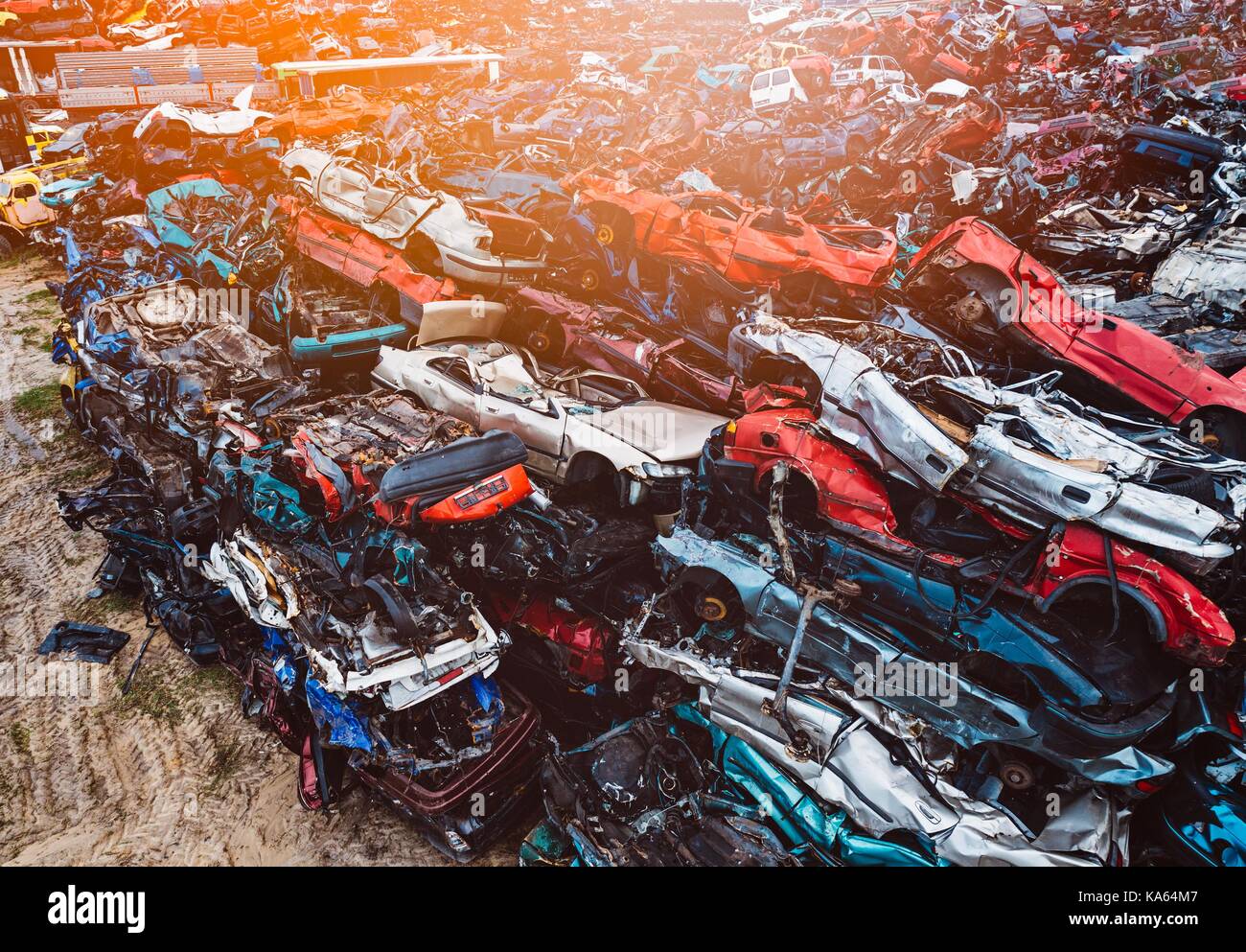 Destroyed scrapped cars stacked on a scrap yard. Car recycling Stock ...
