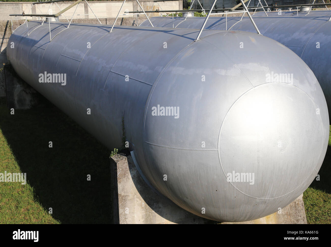 Huge gas storage tanks in an industrial area. Large cylinders are used ...