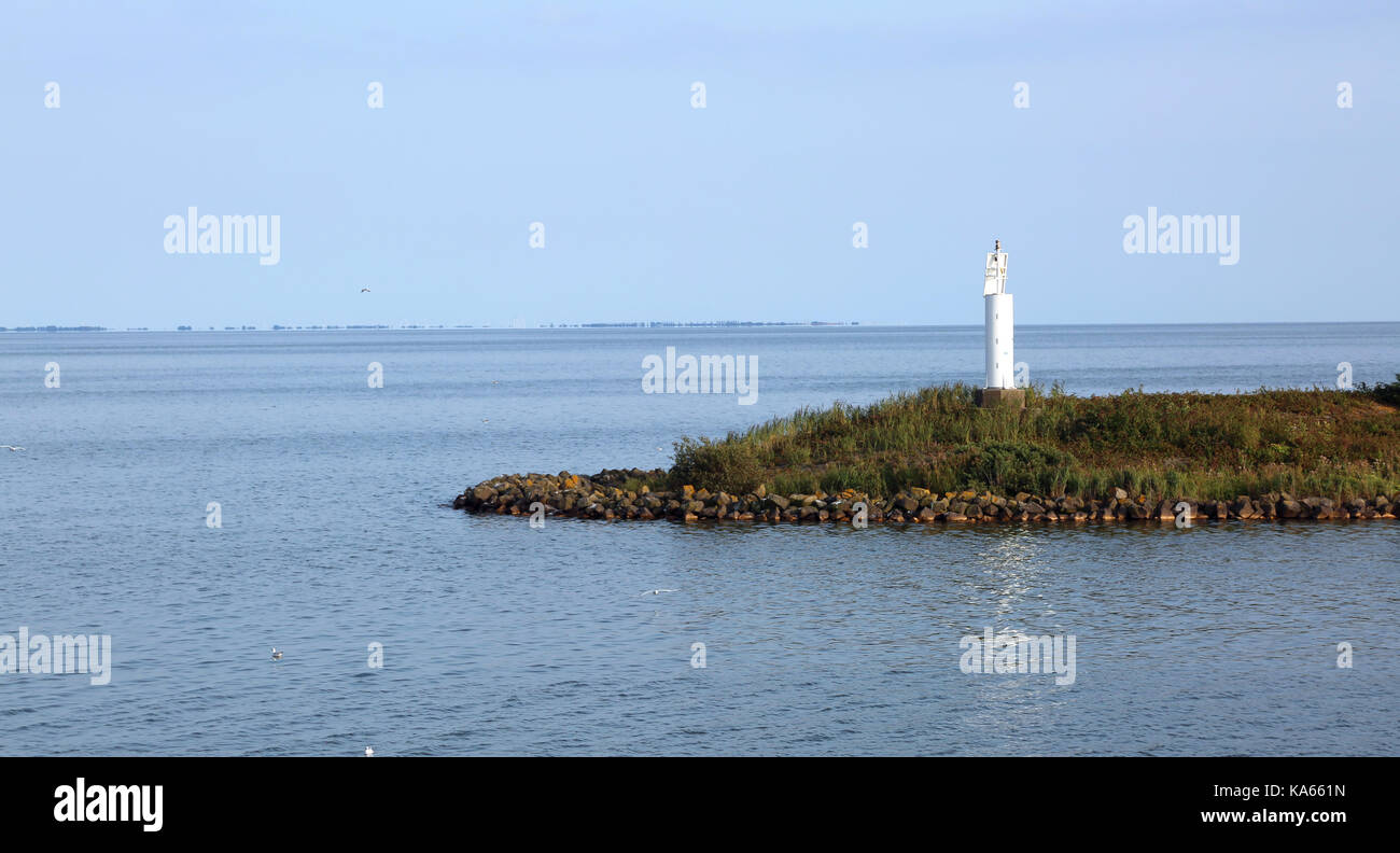 Great lighthouse amidst the large Dutch artificial lake called ...