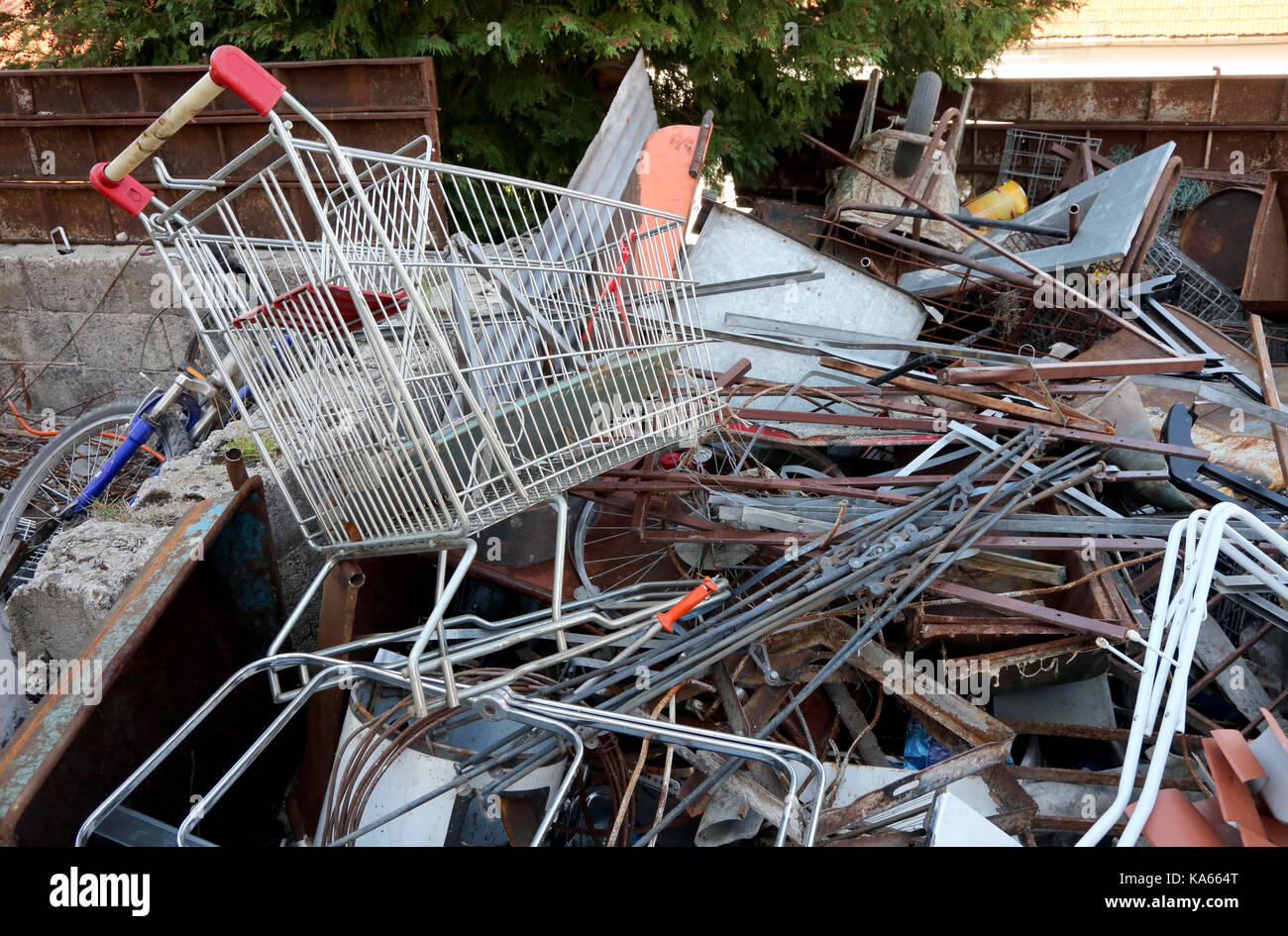 rusty shopping trolley in recycling of ferrous material for disposal ...