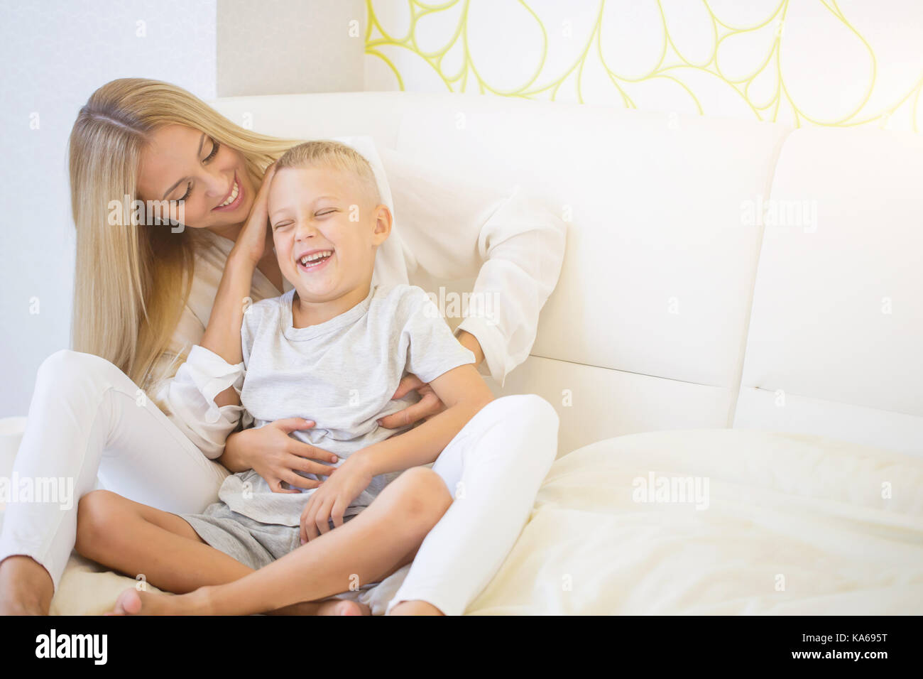 Portrait of young beautiful mother with son Stock Photo - Alamy
