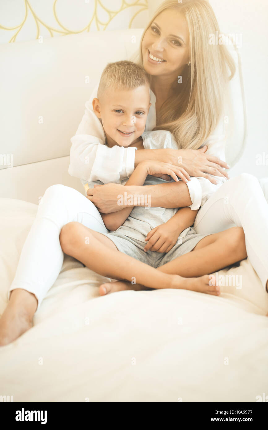 Portrait of young beautiful mother with son Stock Photo - Alamy