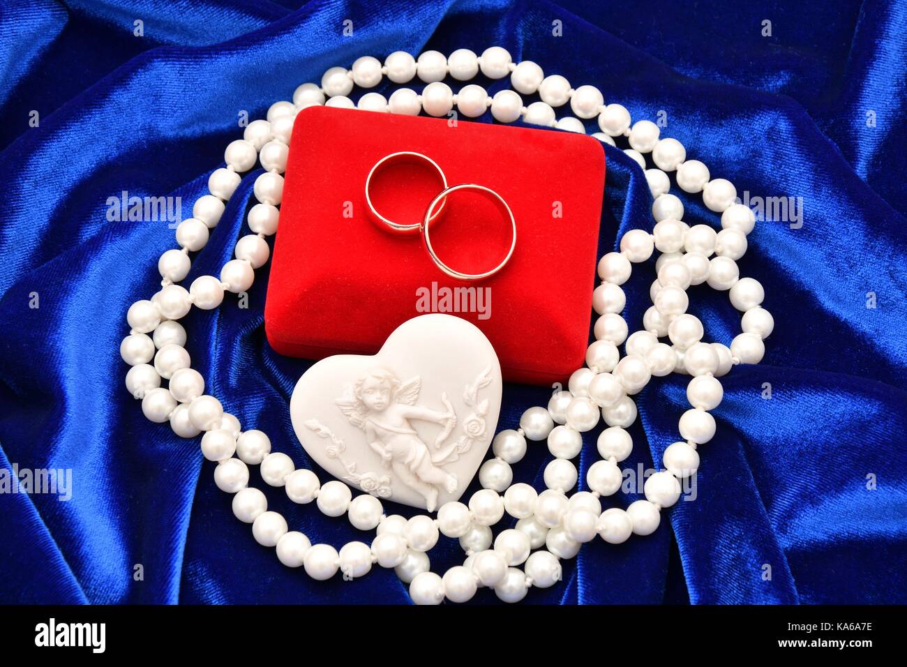 Two wedding rings for bride and groom Stock Photo - Alamy