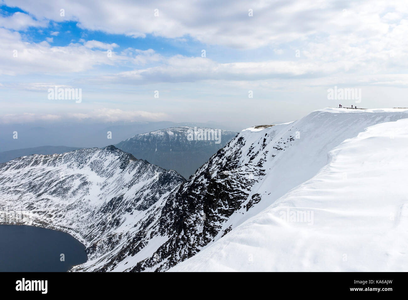 Striding edge winter walker snow hi-res stock photography and images ...