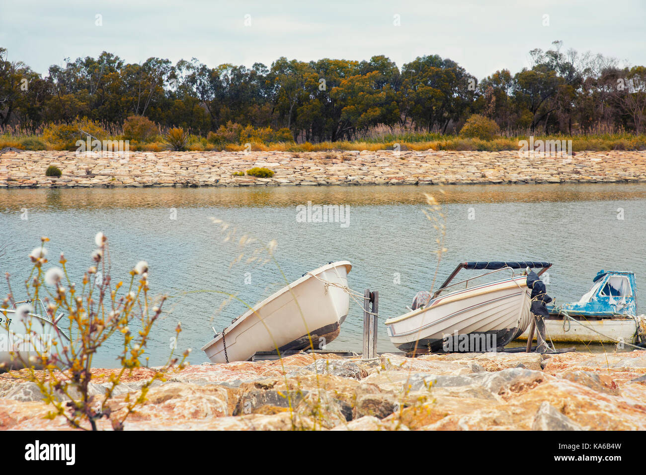 modest fishing boats in the river bank in Guardamar del Segura ...