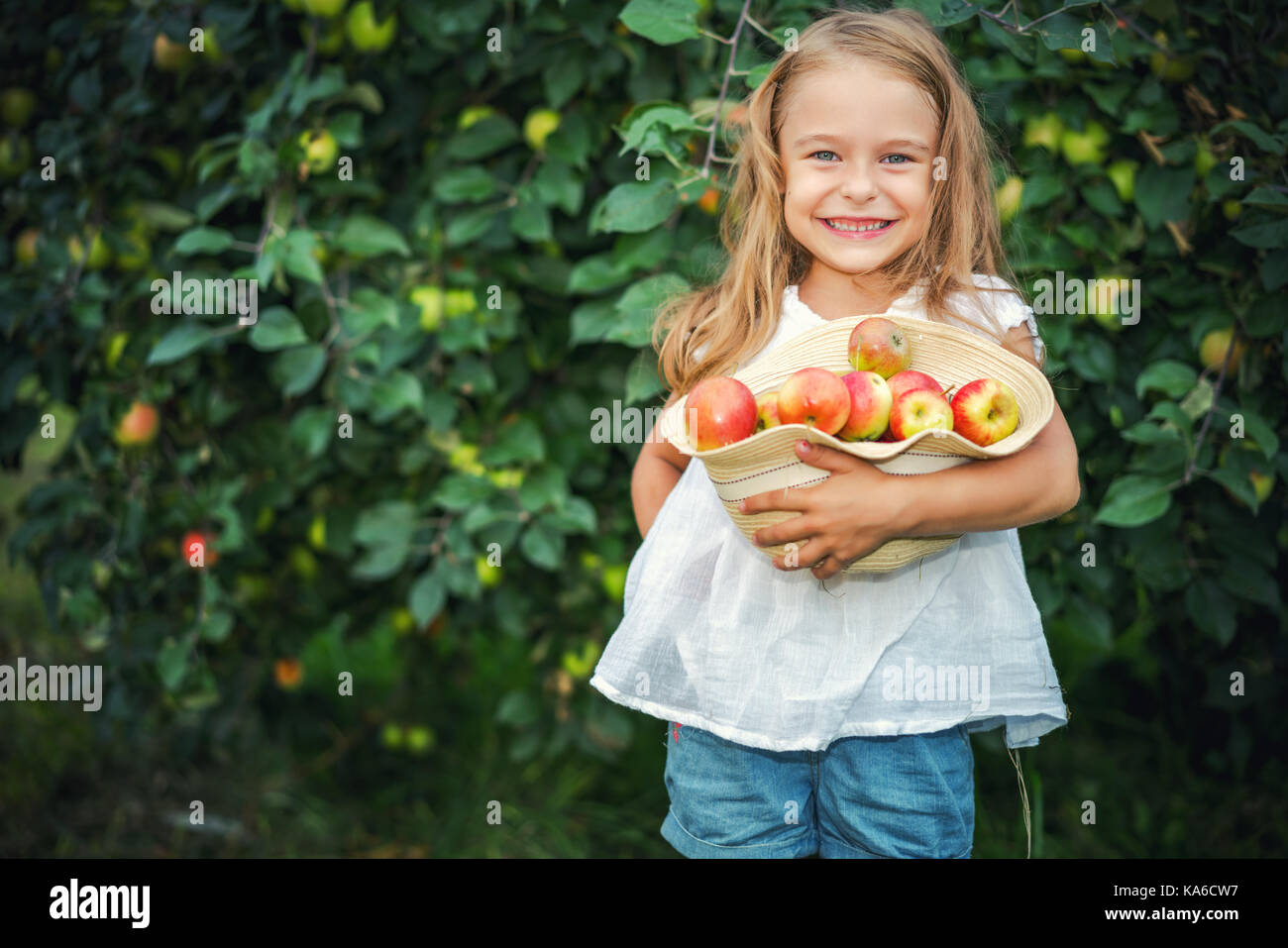 Apple tree girl hi-res stock photography and images - Alamy