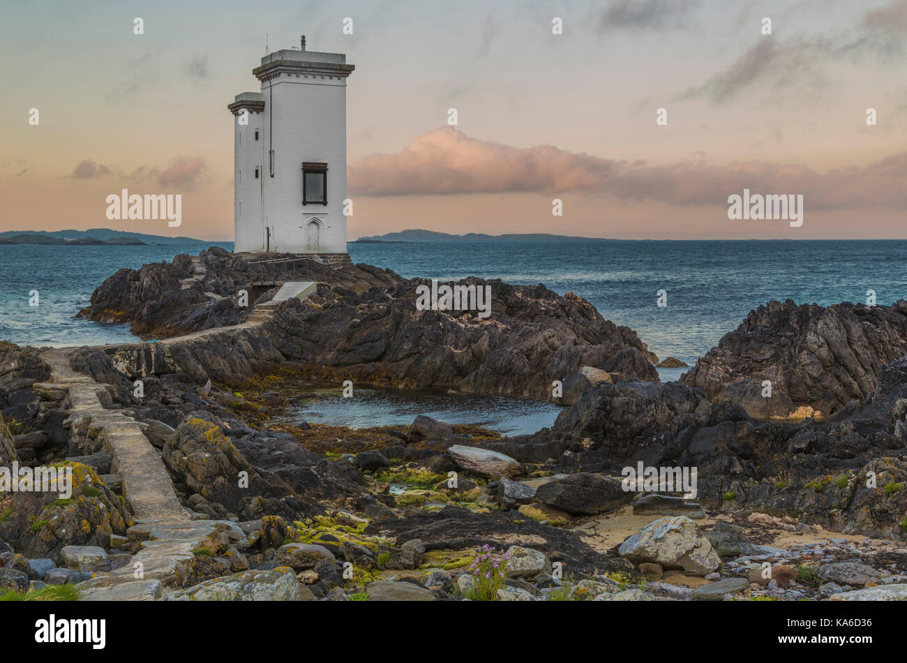 Port Ellen Lighthouse, Carraig Fhada Lighthouse in evening light after ...