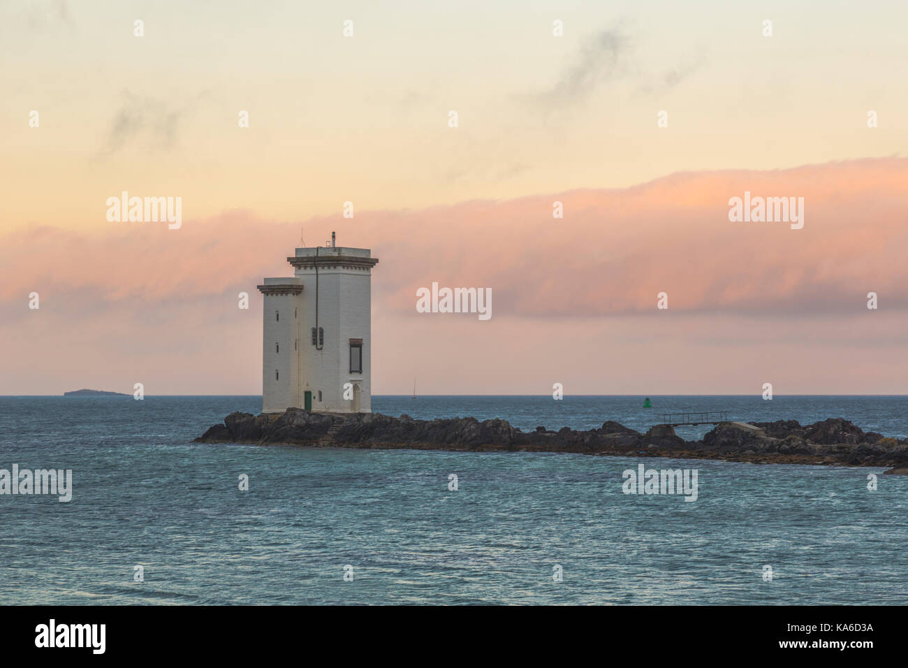 Port Ellen Lighthouse, Carraig Fhada Lighthouse in evening light after ...