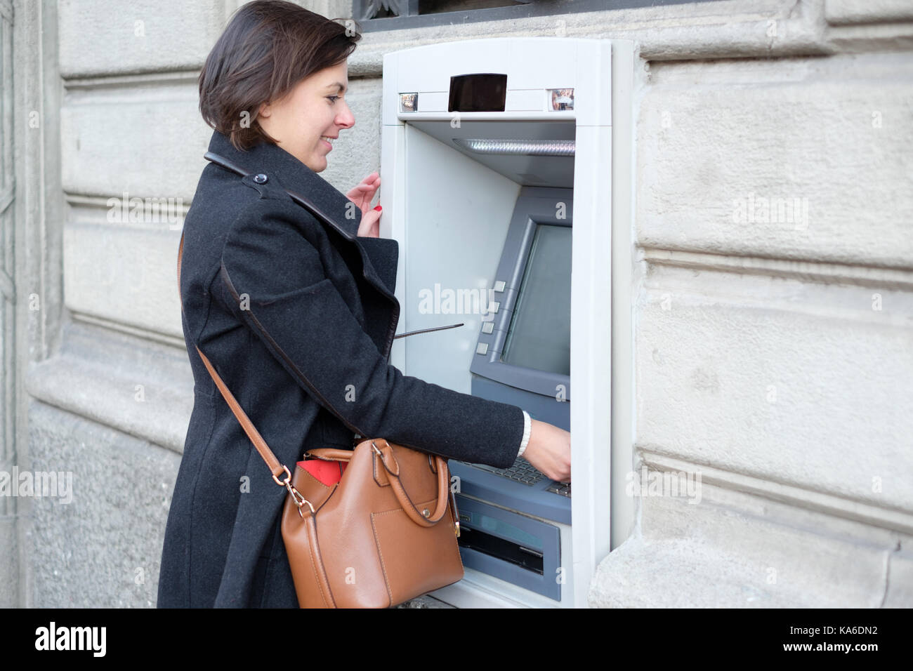 Woman atm hi-res stock photography and images - Alamy