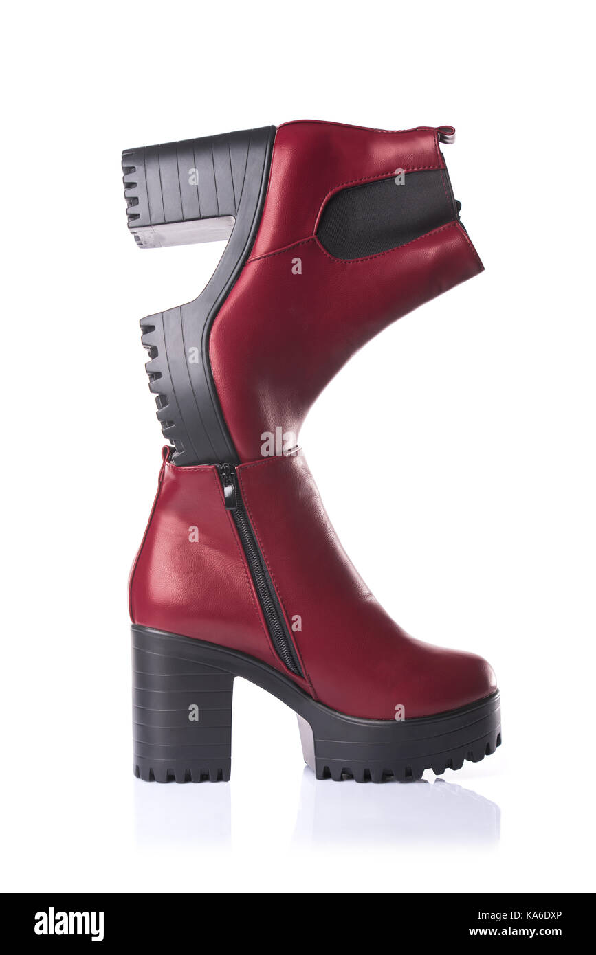 Pair of dark red ankle boots, isolated on white background Stock Photo ...