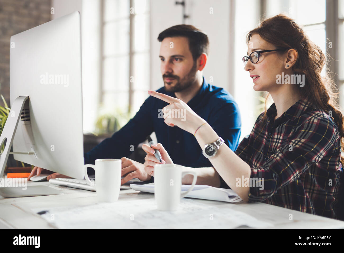 Software engineers working on project Stock Photo - Alamy