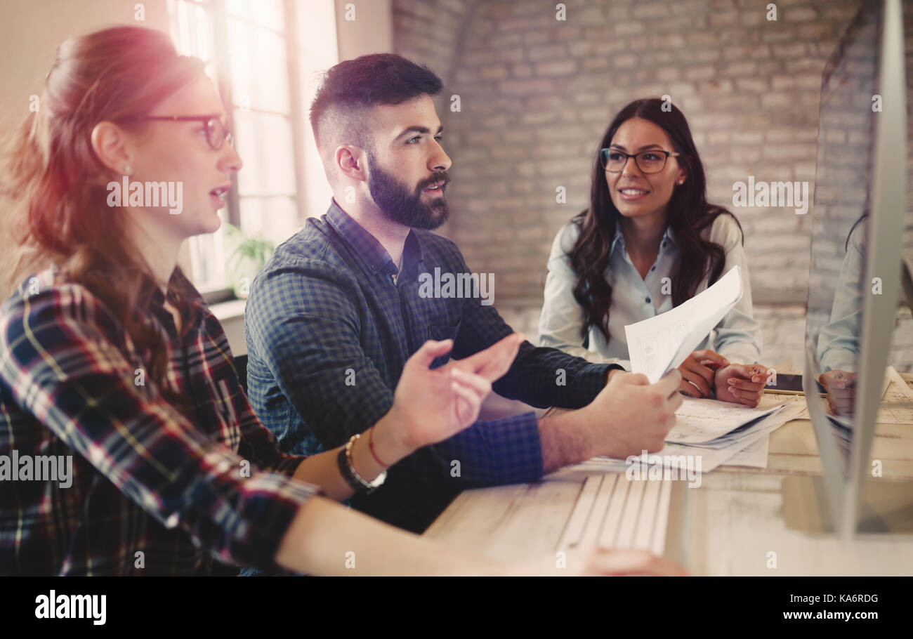 Coworking and corporate colleagues working in office Stock Photo - Alamy