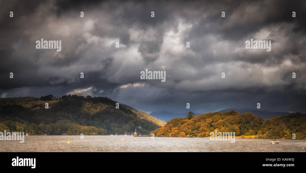 Looking north up Lake Windermere as sunlight breaks through the heavy ...
