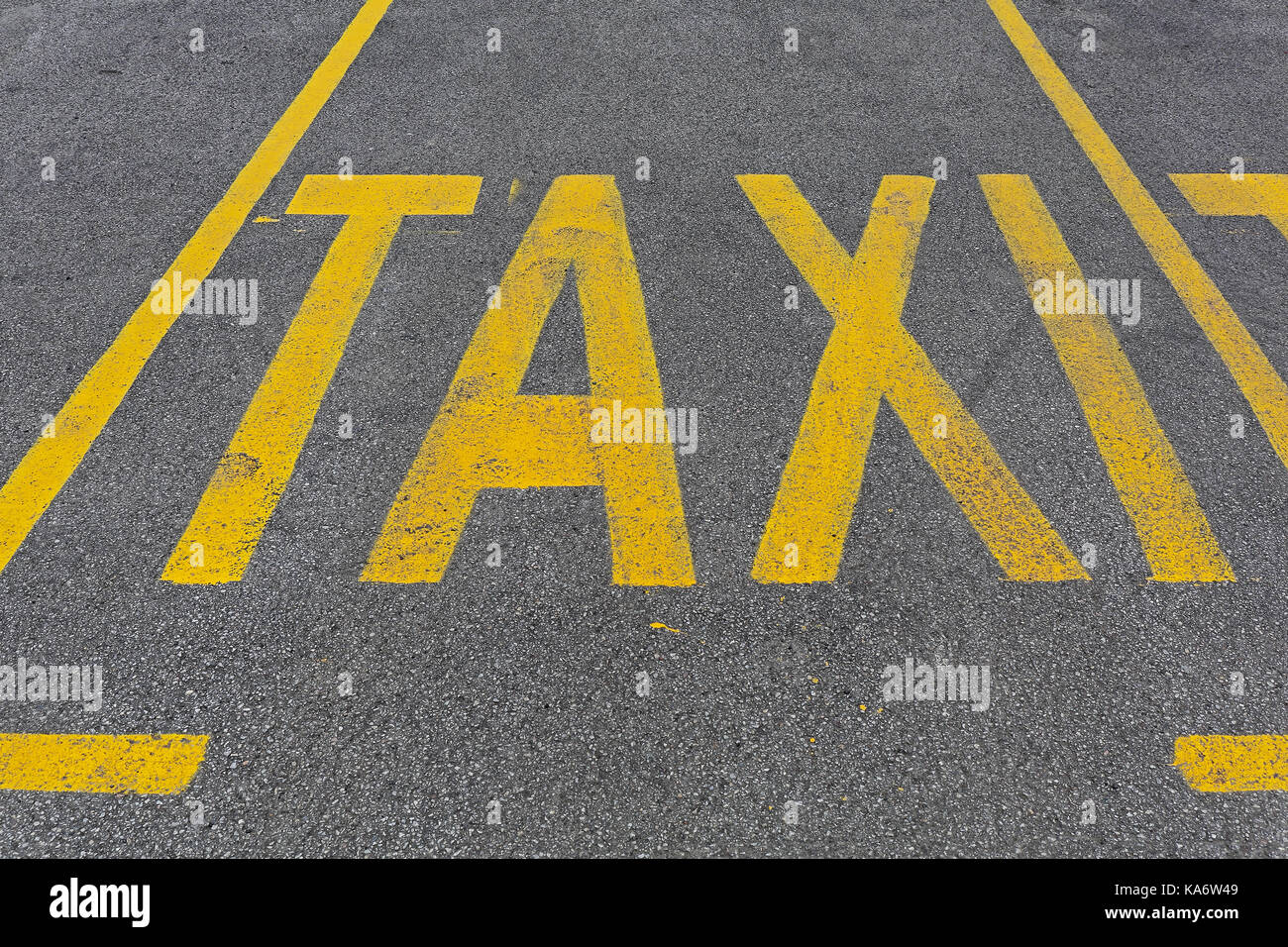 Yellow Taxi Parking Sign at Street Stock Photo - Alamy
