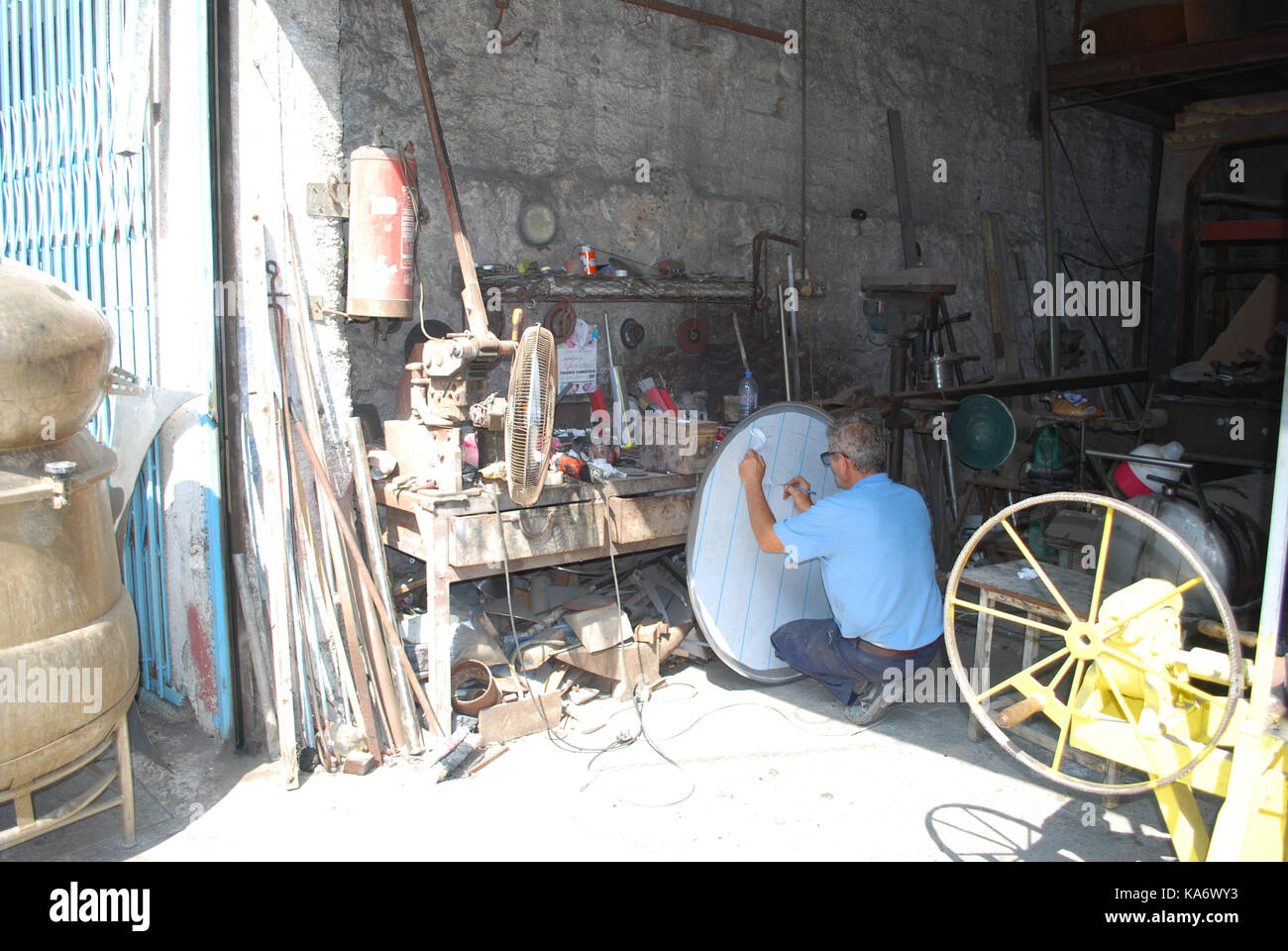 Cypriot man working in his workshop in old Larnaca, Cyprus Stock Photo ...