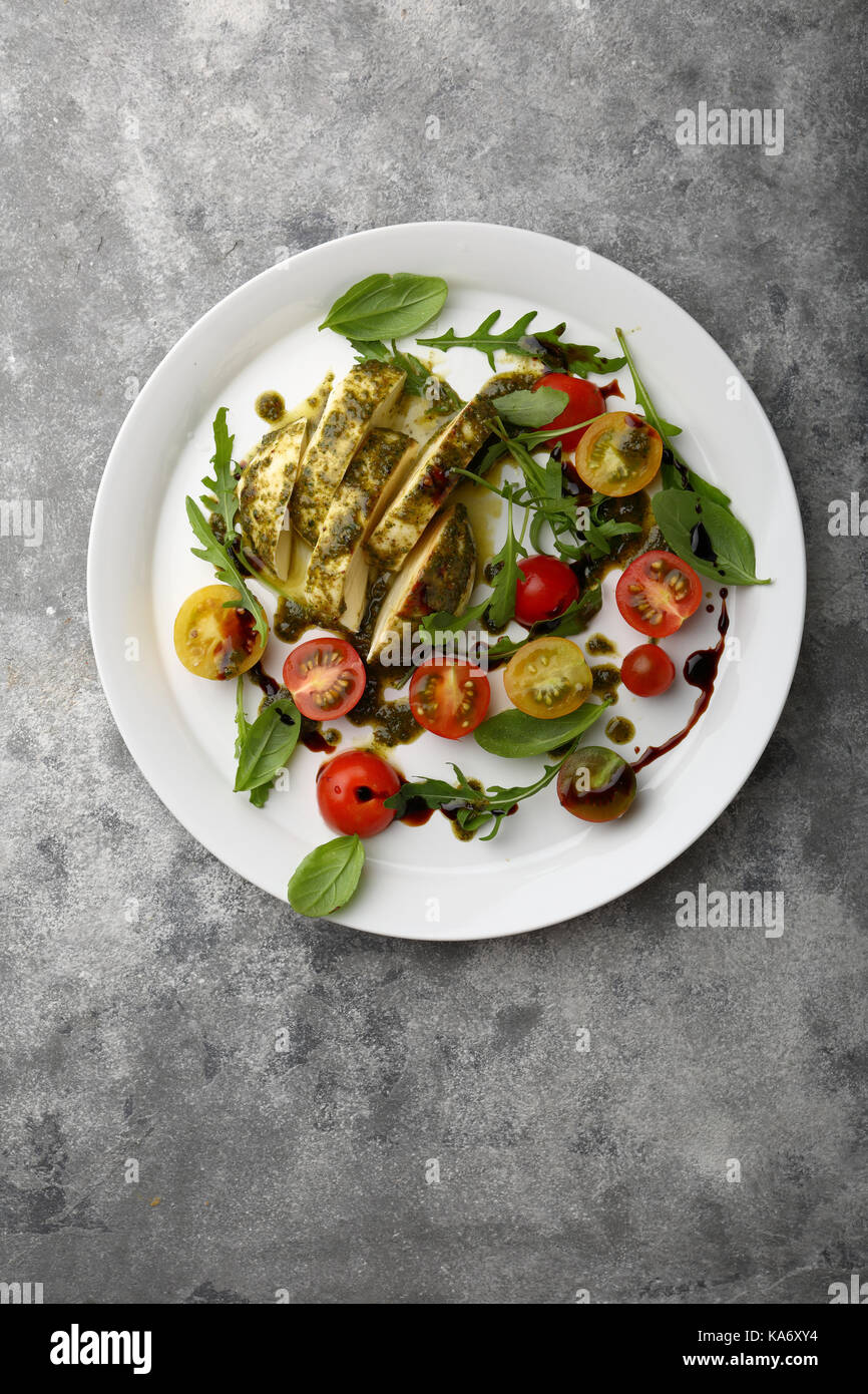 Salad with tomatoes, food top view Stock Photo - Alamy