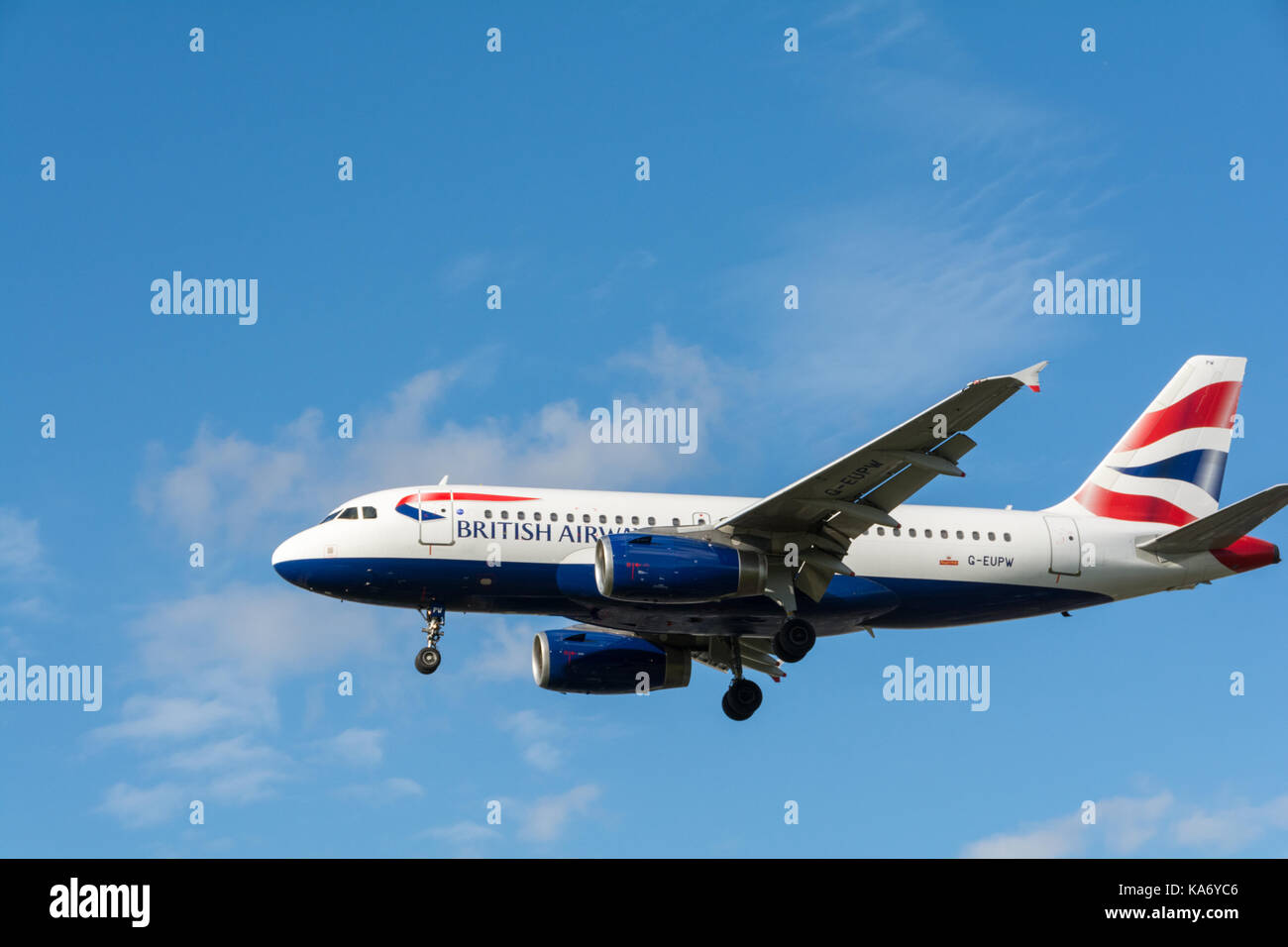 A low flying British Airways plane coming in to land at Heathrow ...