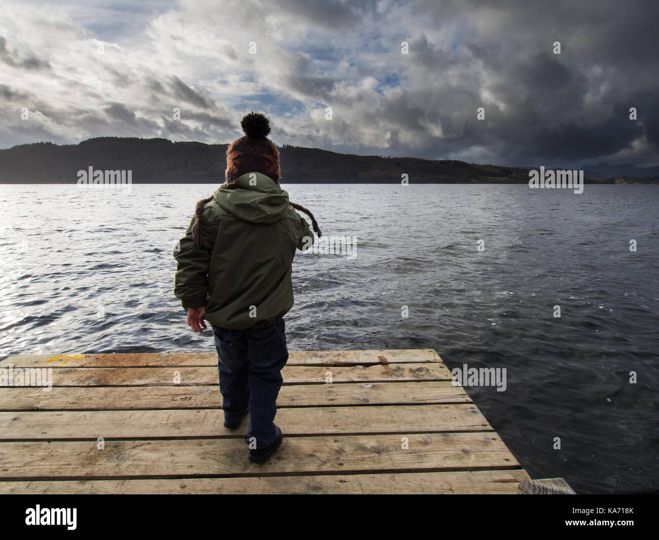 Lachlan on the jetty at Millerground, Windermere Stock Photo - Alamy