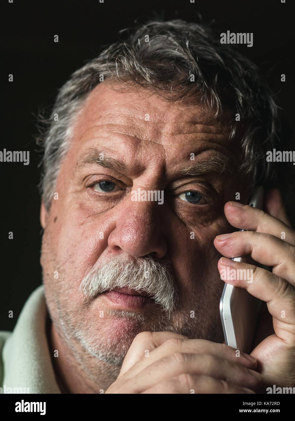 middle-aged sad caucasian man calling by smartphone Stock Photo - Alamy