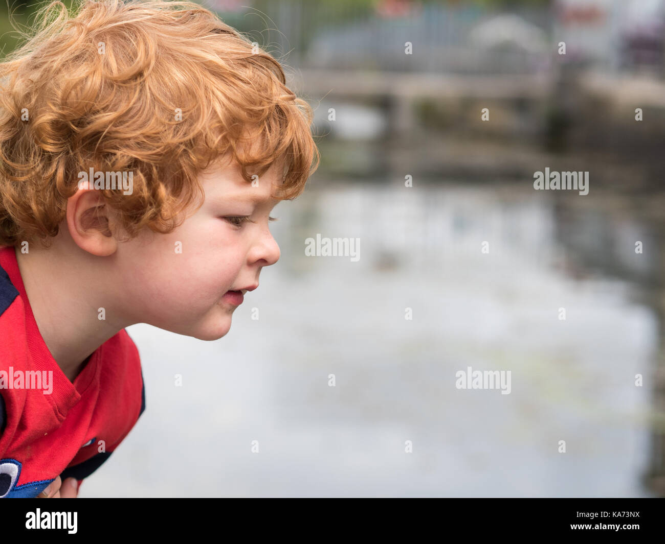 Looking over the edge Stock Photo - Alamy